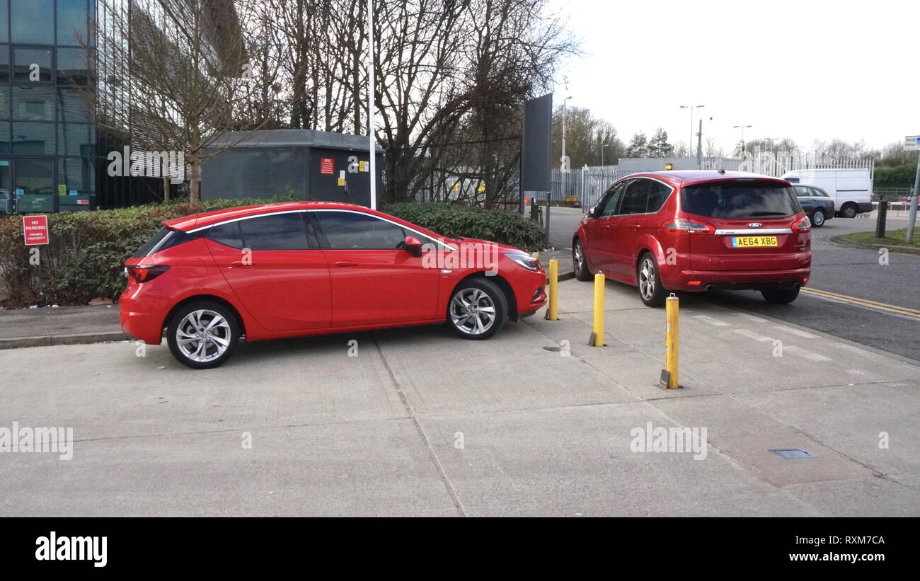 Red car parked at Oxygen car park Acton, London, United Kingdom Stock ...