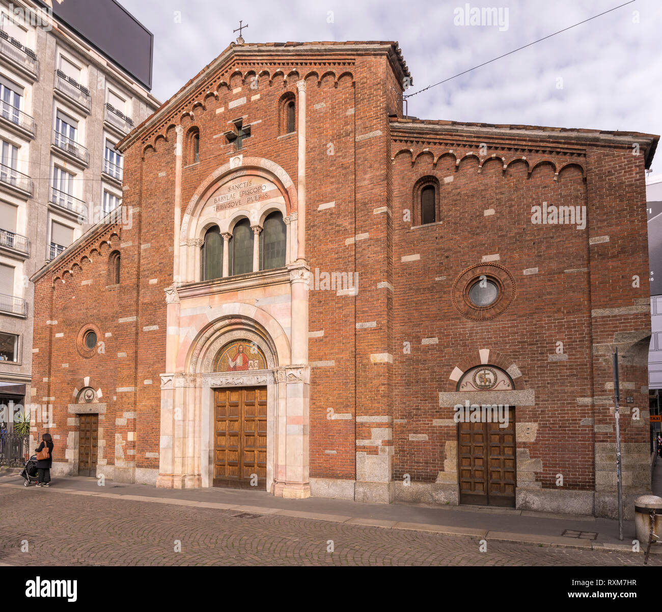 bricks facade of Romanesque san Babila church in city center, shot in ...