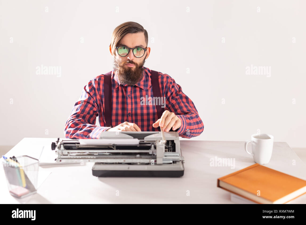 People and technology concept - Portrait of writer working on ...