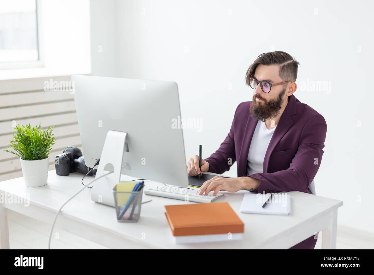 people, design and style concept - graphic designer sketching new ...