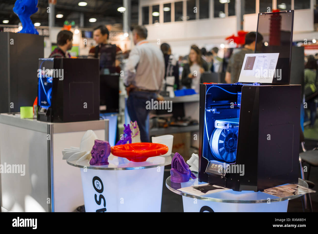 Automatic 3D printers working at modern technology exhibition Stock ...