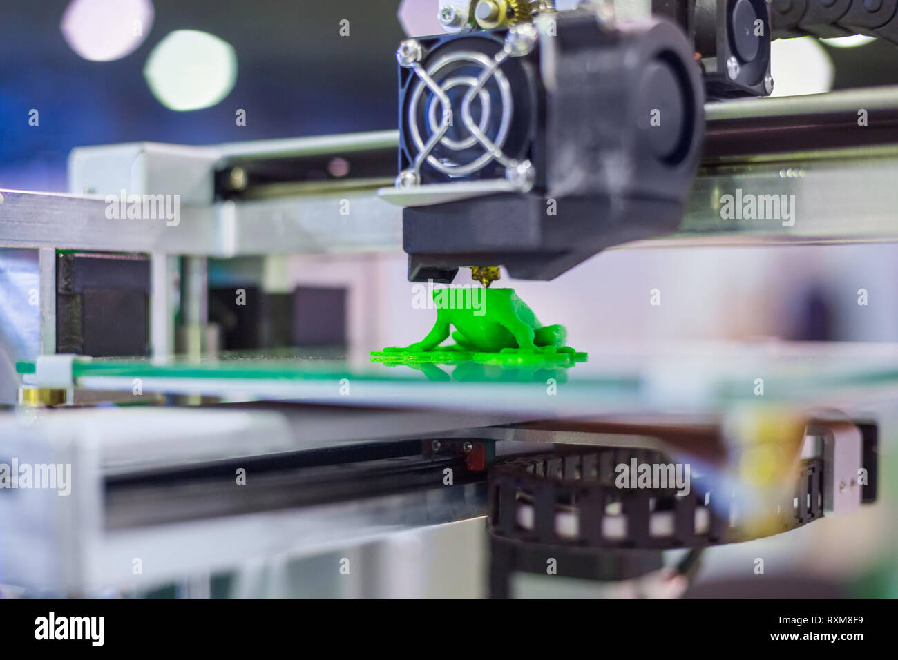 Three dimensional printing machine prints physical 3D model Stock Photo ...