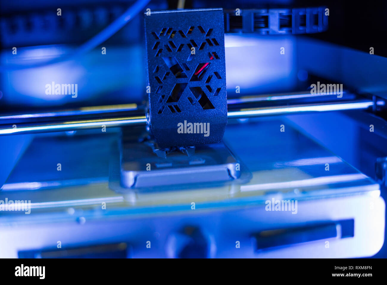 Process of printing plastic model on automatic 3d printer machine Stock ...