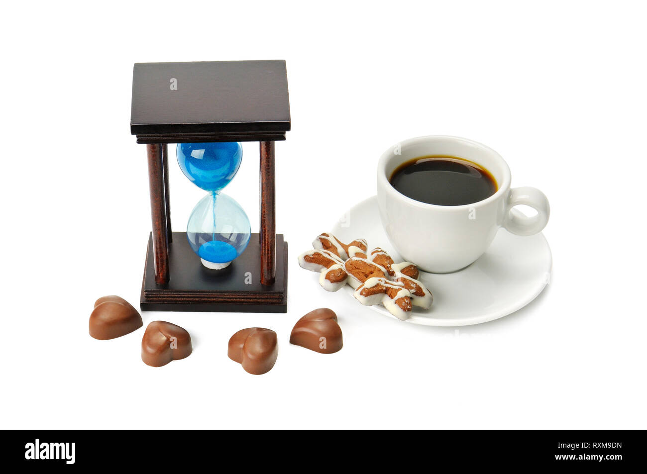 hourglass and a cup of coffee isolated on white background Stock Photo ...