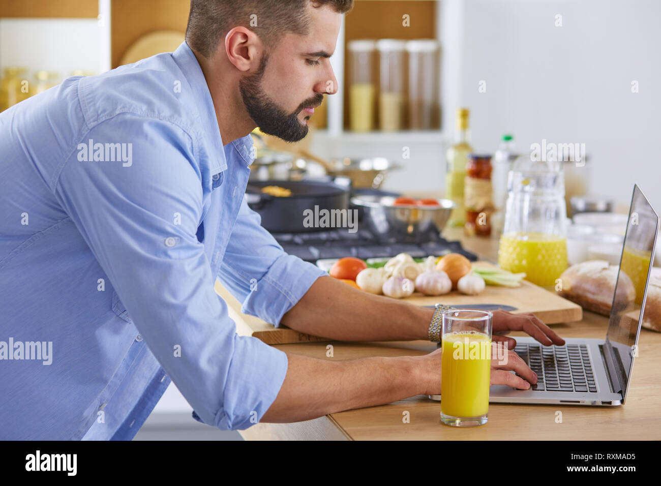 a business man breakfasts with notebook and juice Stock Photo - Alamy