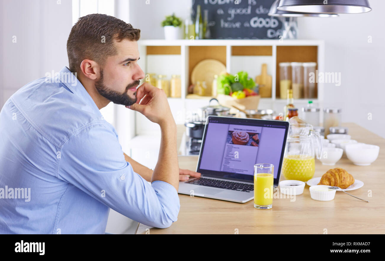 a business man breakfasts with notebook and juice Stock Photo - Alamy