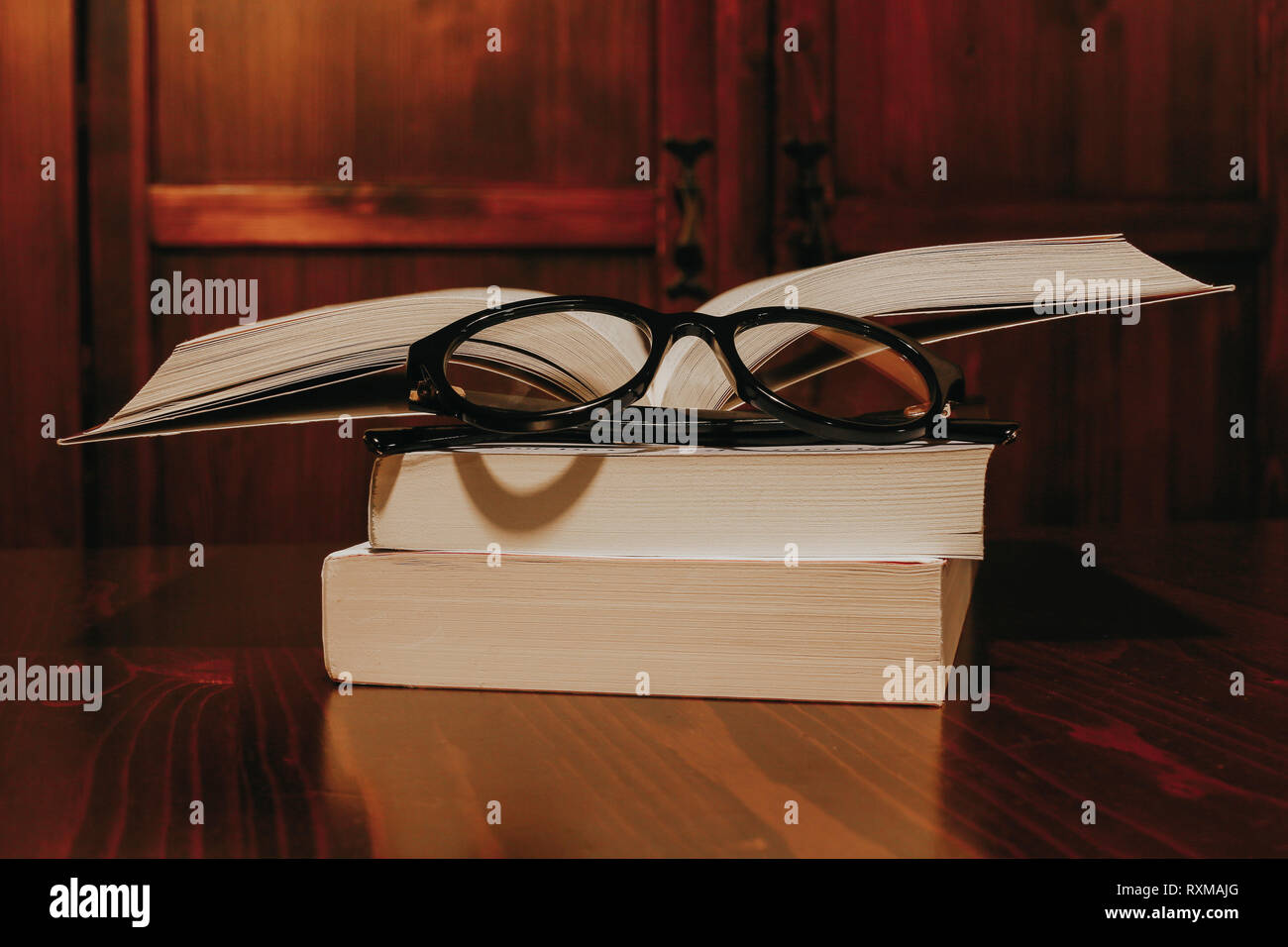 books and glasses Stock Photo - Alamy