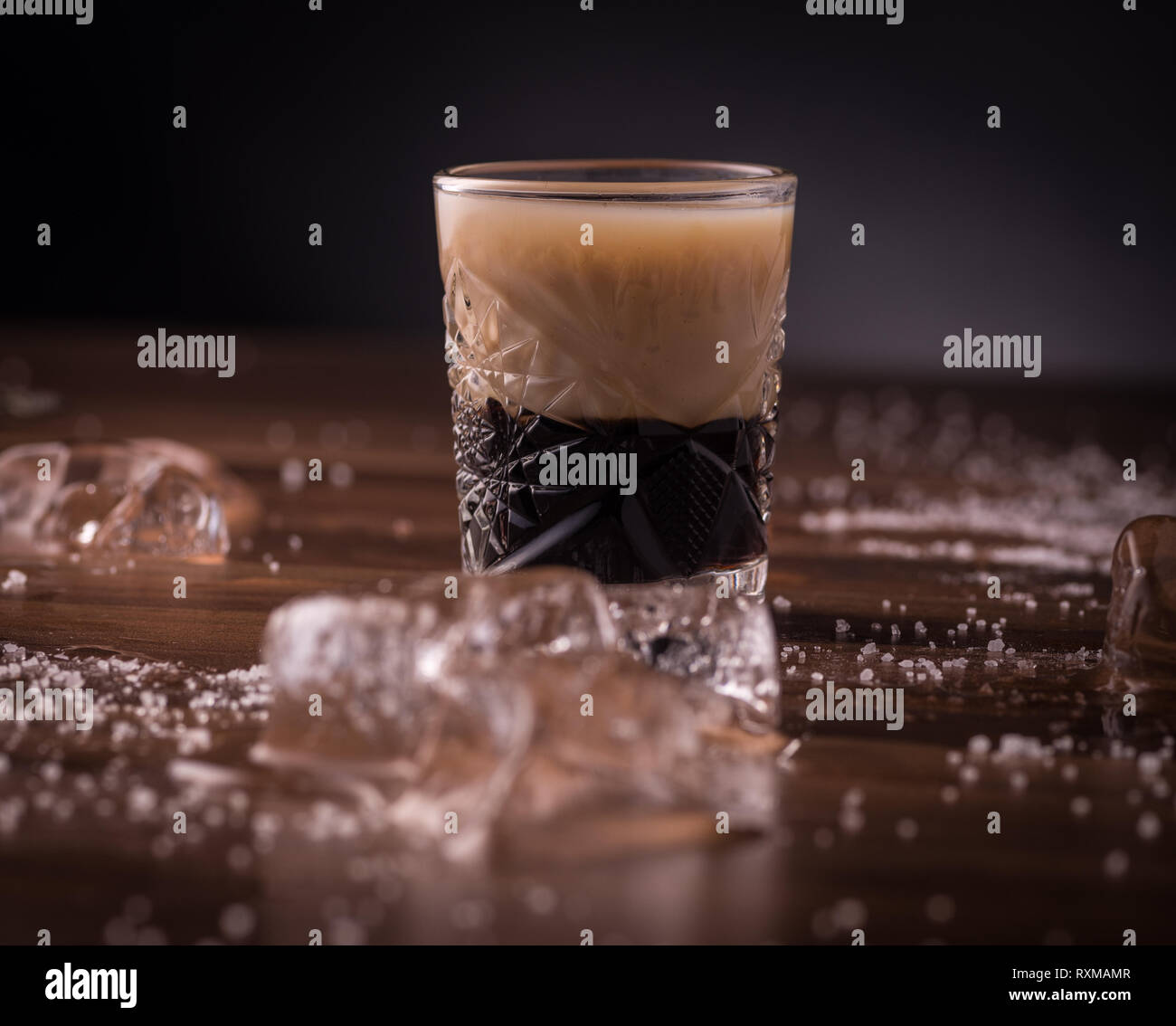 Colour Cocktail on dark wooden background Stock Photo - Alamy