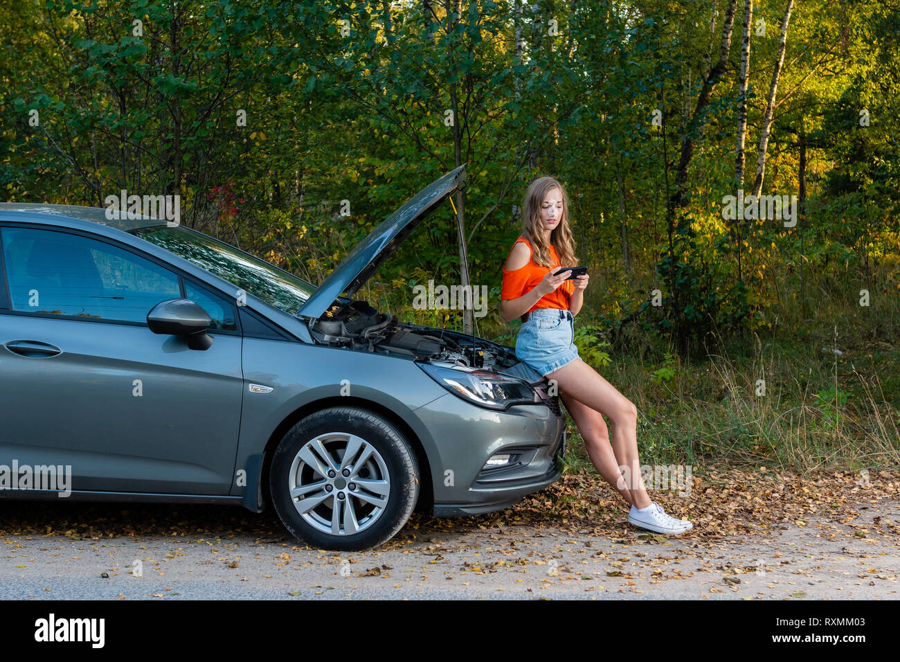 Female driver hand texting hi-res stock photography and images - Alamy
