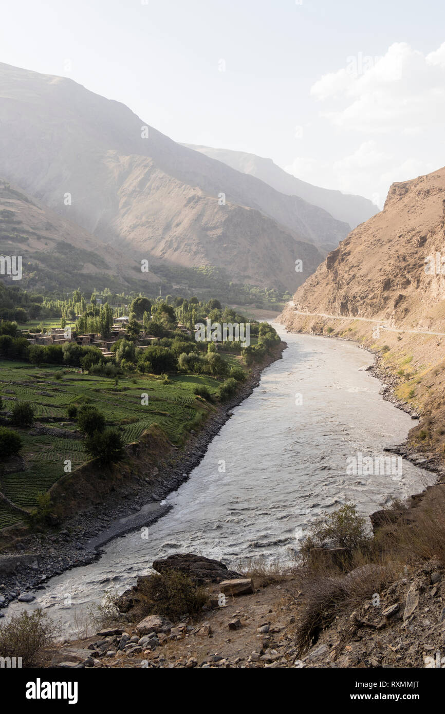 Border river Panj River in Wakhan valley with Tajikistan right and ...