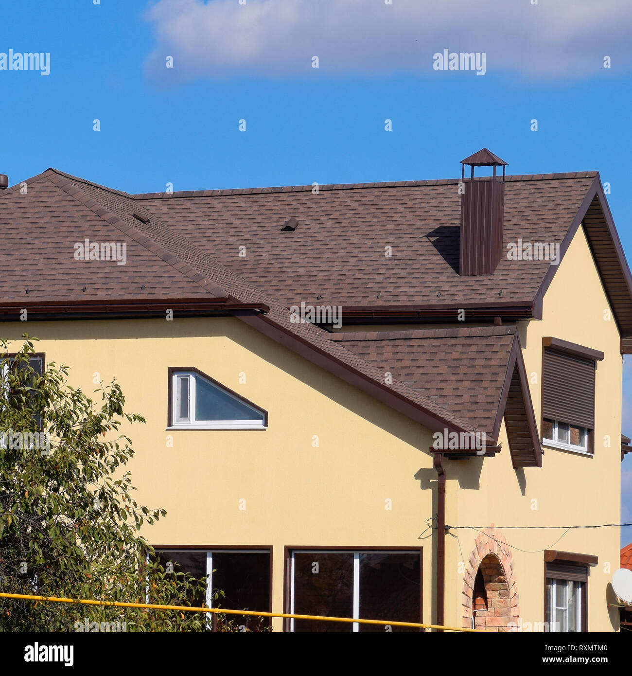 Decorative metal tile on a roof. Types of a roof of roofs. Decorative ...