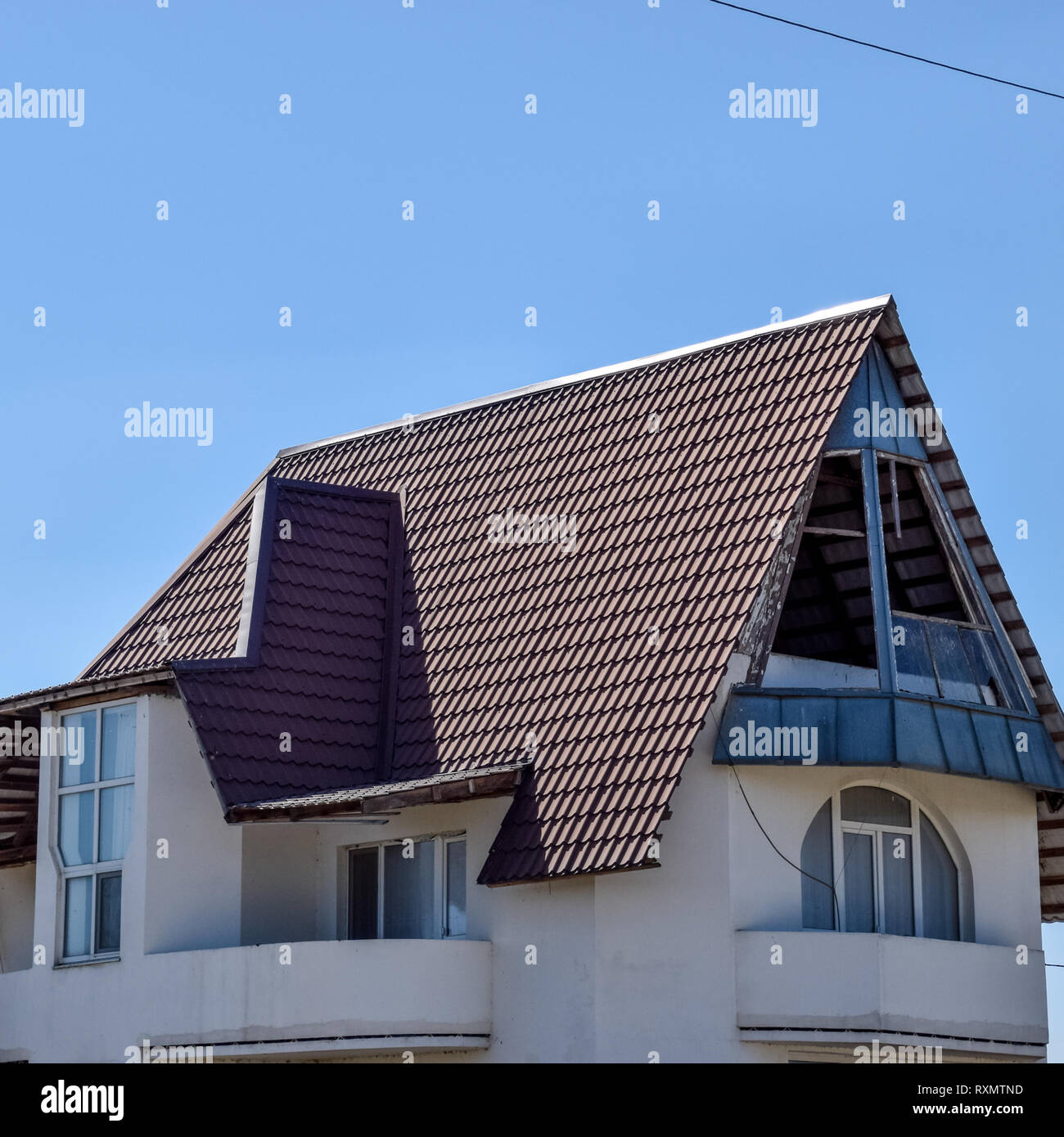 Detached house with a roof made of steel sheets. Roof metal sheets ...