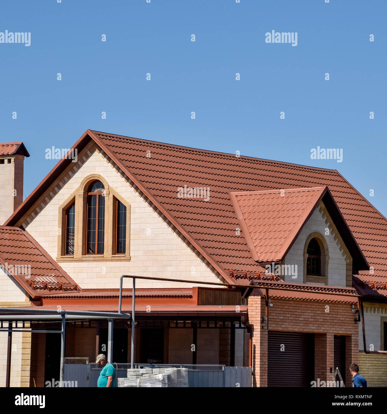 Detached house with a roof made of steel sheets. Roof metal sheets ...