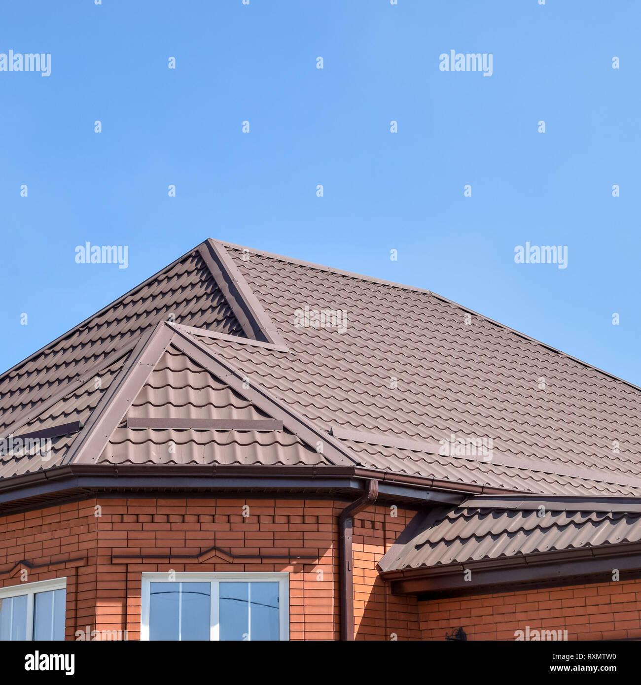Detached house with a roof made of steel sheets. Roof metal sheets ...
