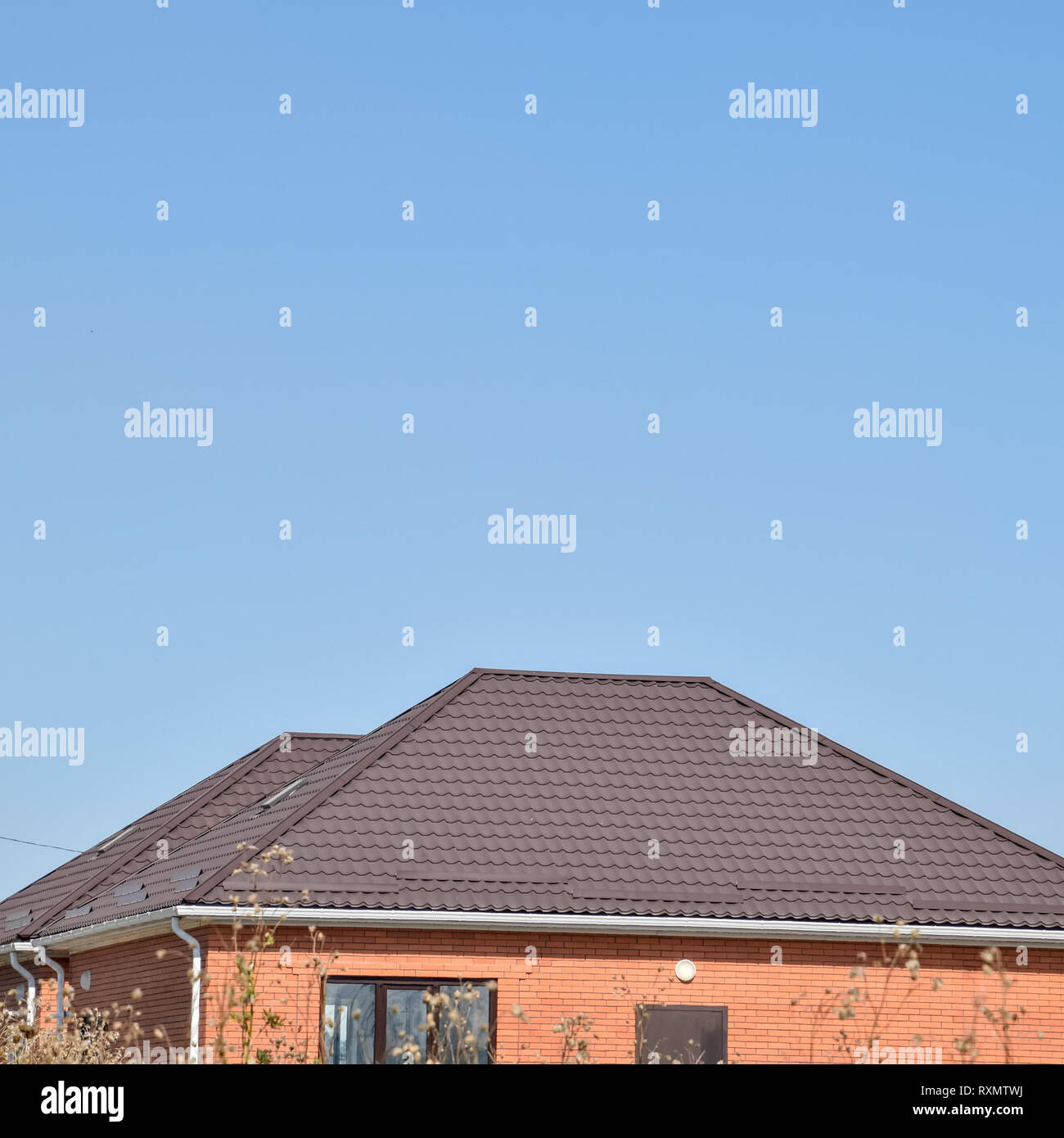 Detached house with a roof made of steel sheets. Roof metal sheets ...