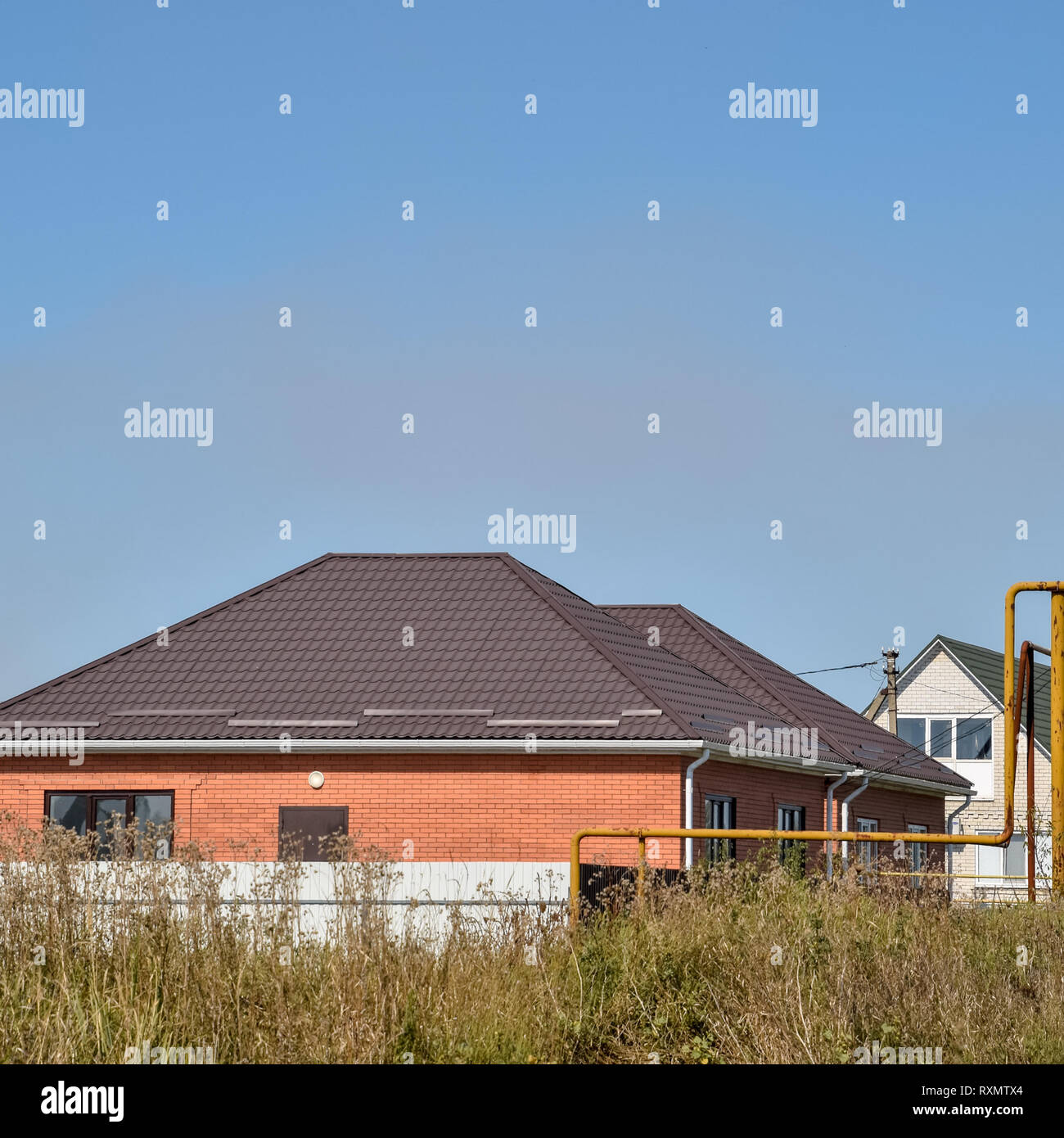 Detached house with a roof made of steel sheets. Roof metal sheets ...