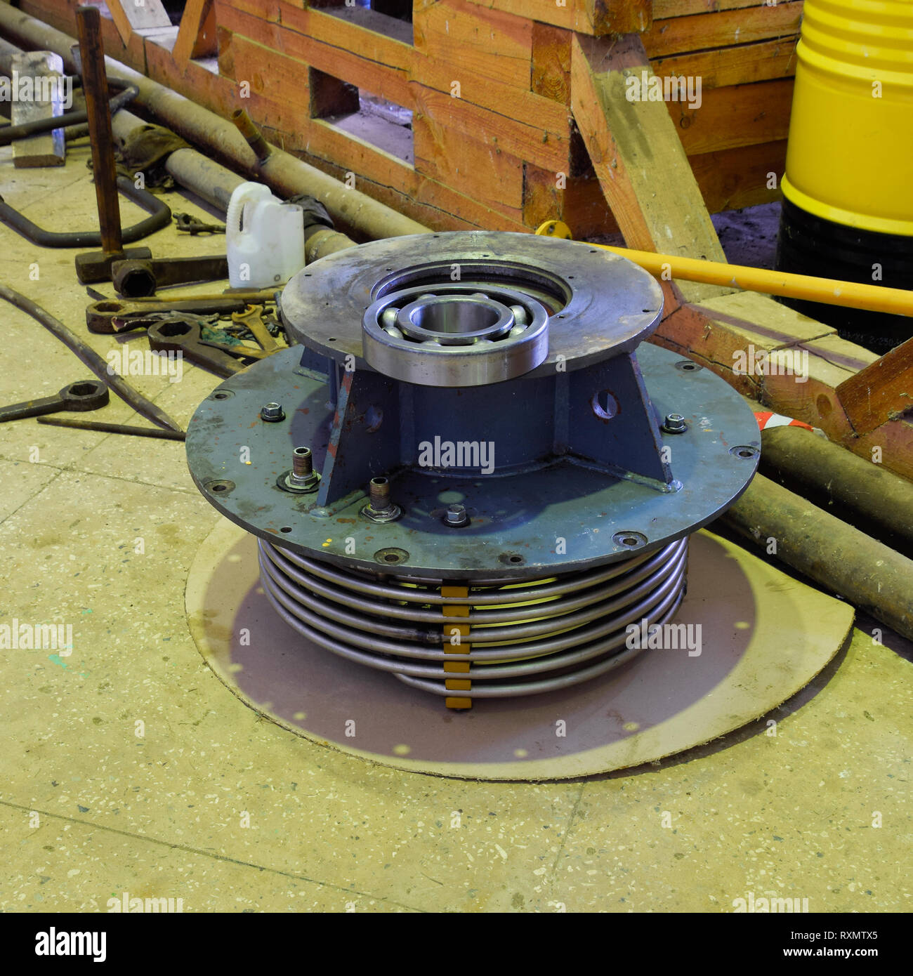 Disassembled element of an induction motor. Cooling pipes and rolling ...