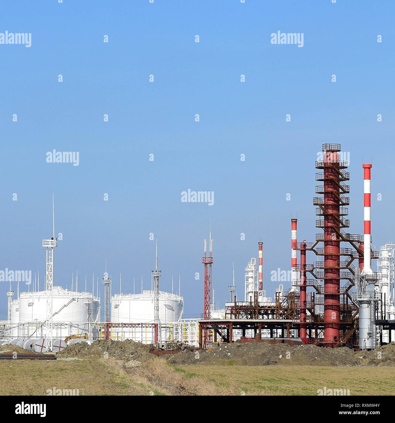 Distillation columns, pipes and other equipment furnaces refinery. The ...