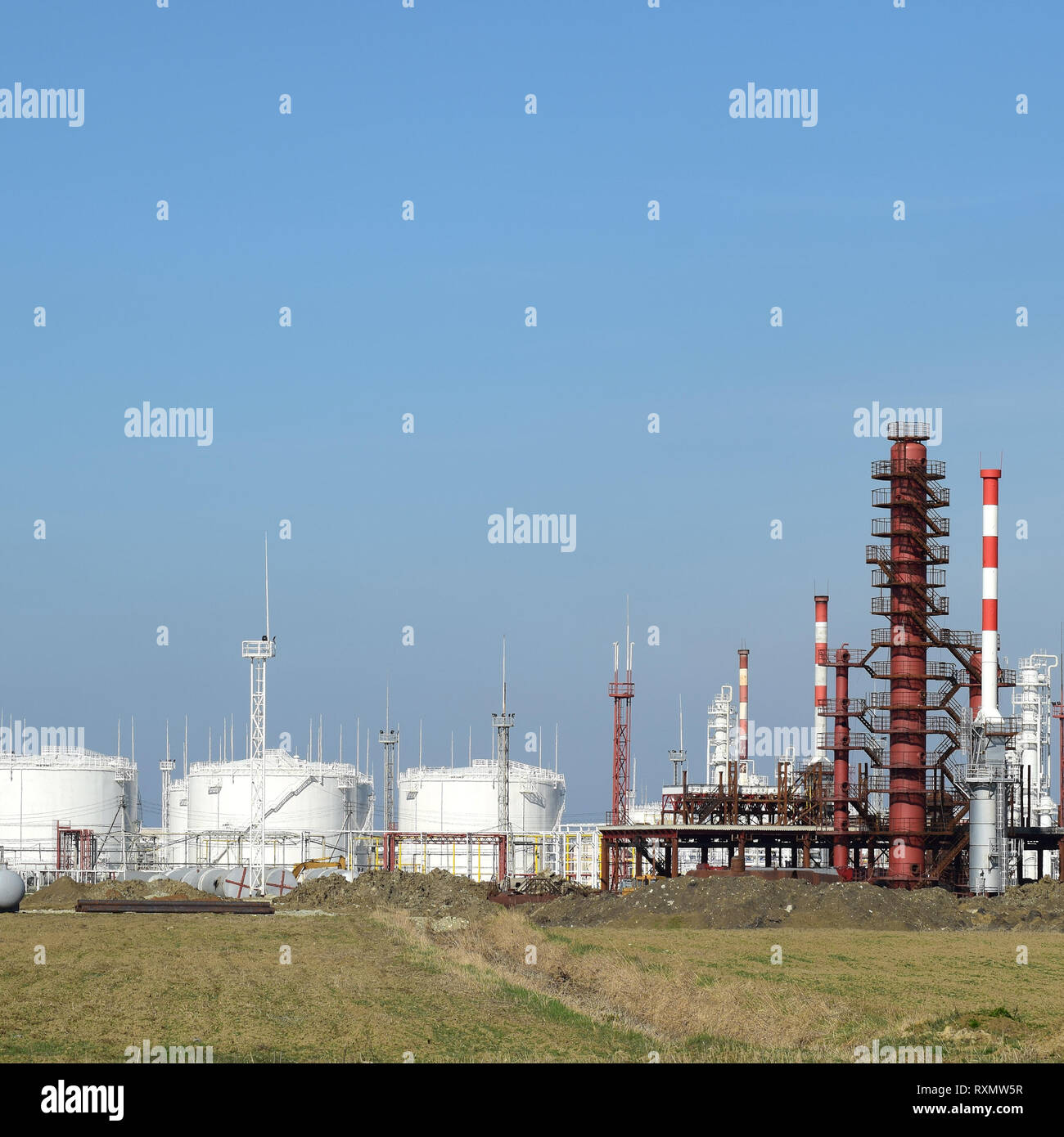 Distillation columns, pipes and other equipment furnaces refinery. The ...