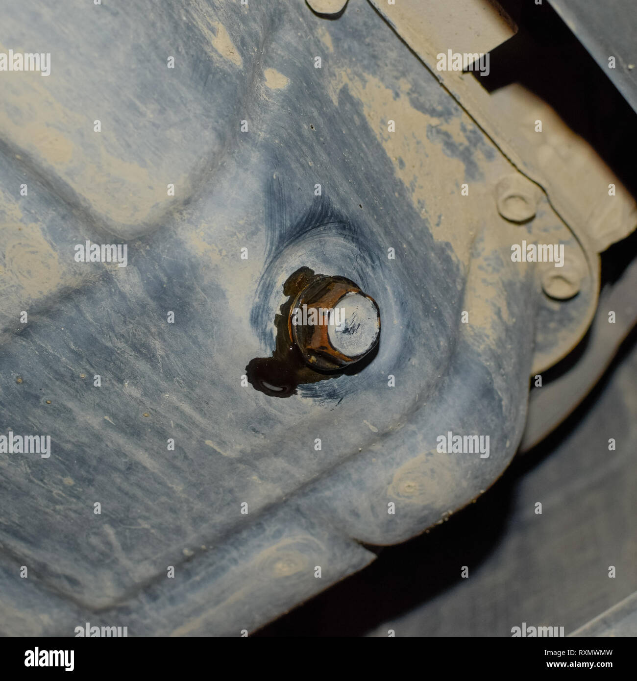Drain the old oil from the engine through the drain plug. Changing the ...
