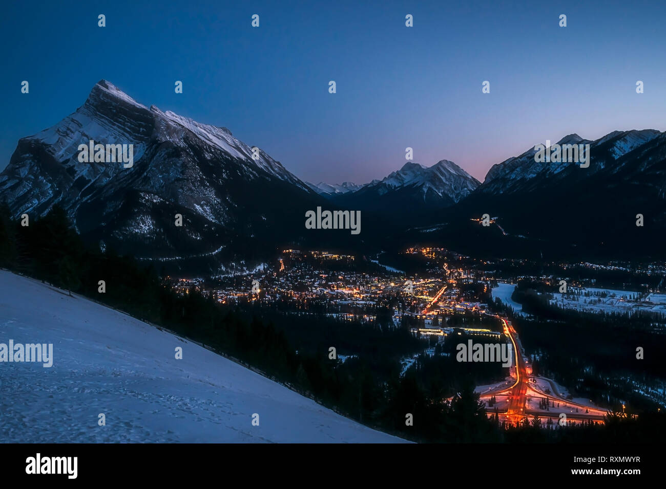 Banff and Mount Rundle in the early evening, Banff National Park ...
