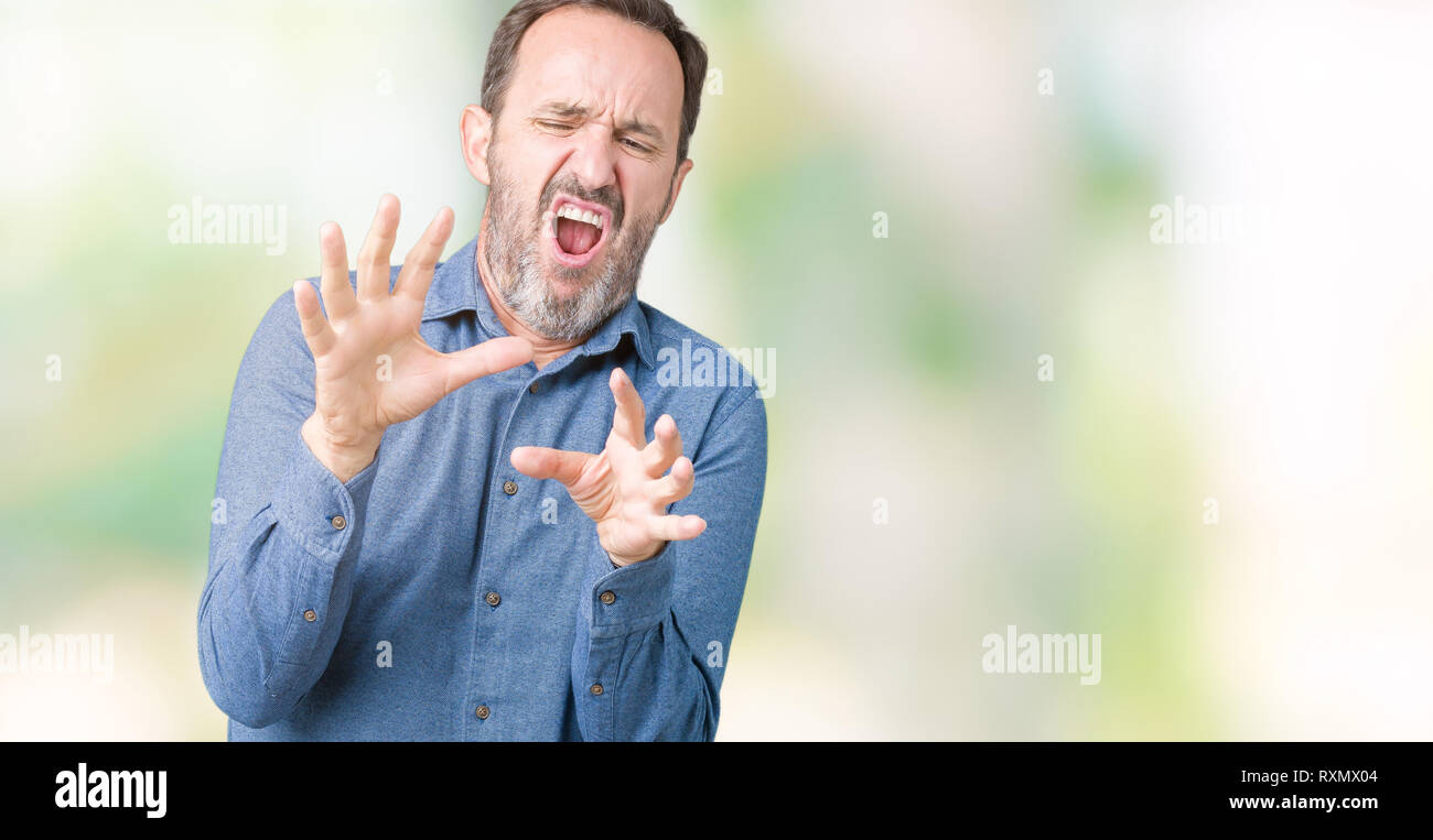 Handsome middle age elegant senior man over isolated background afraid ...