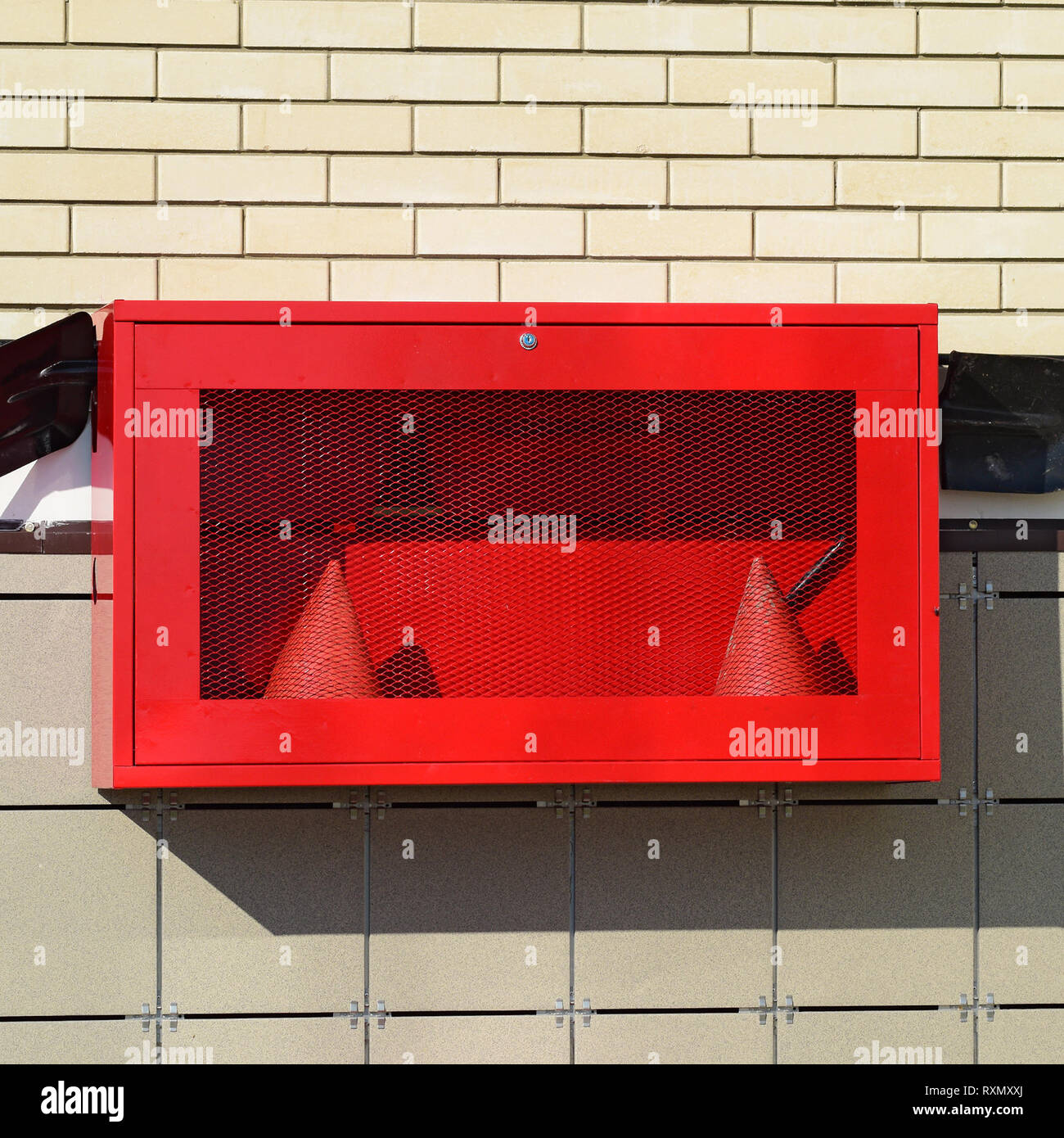 Fire Shield on the wall. Set primary fire extinguishing equipment Stock ...