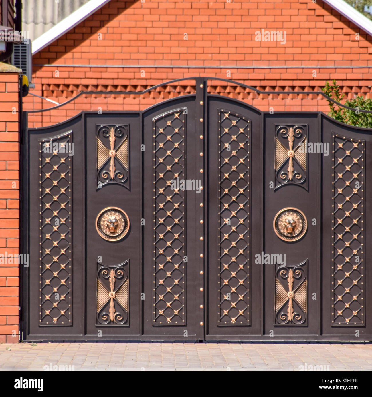 Gates of brown metal sheets. Roofing materials. Modern types of roofing ...