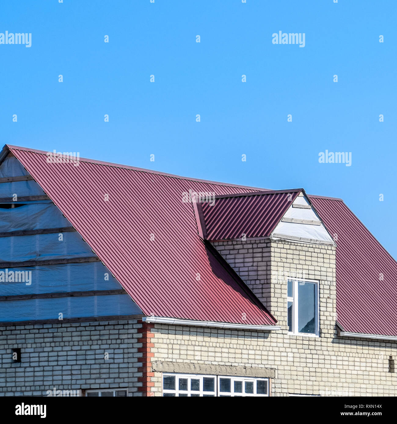 House of cinder block. The house with plastic windows and a roof of ...
