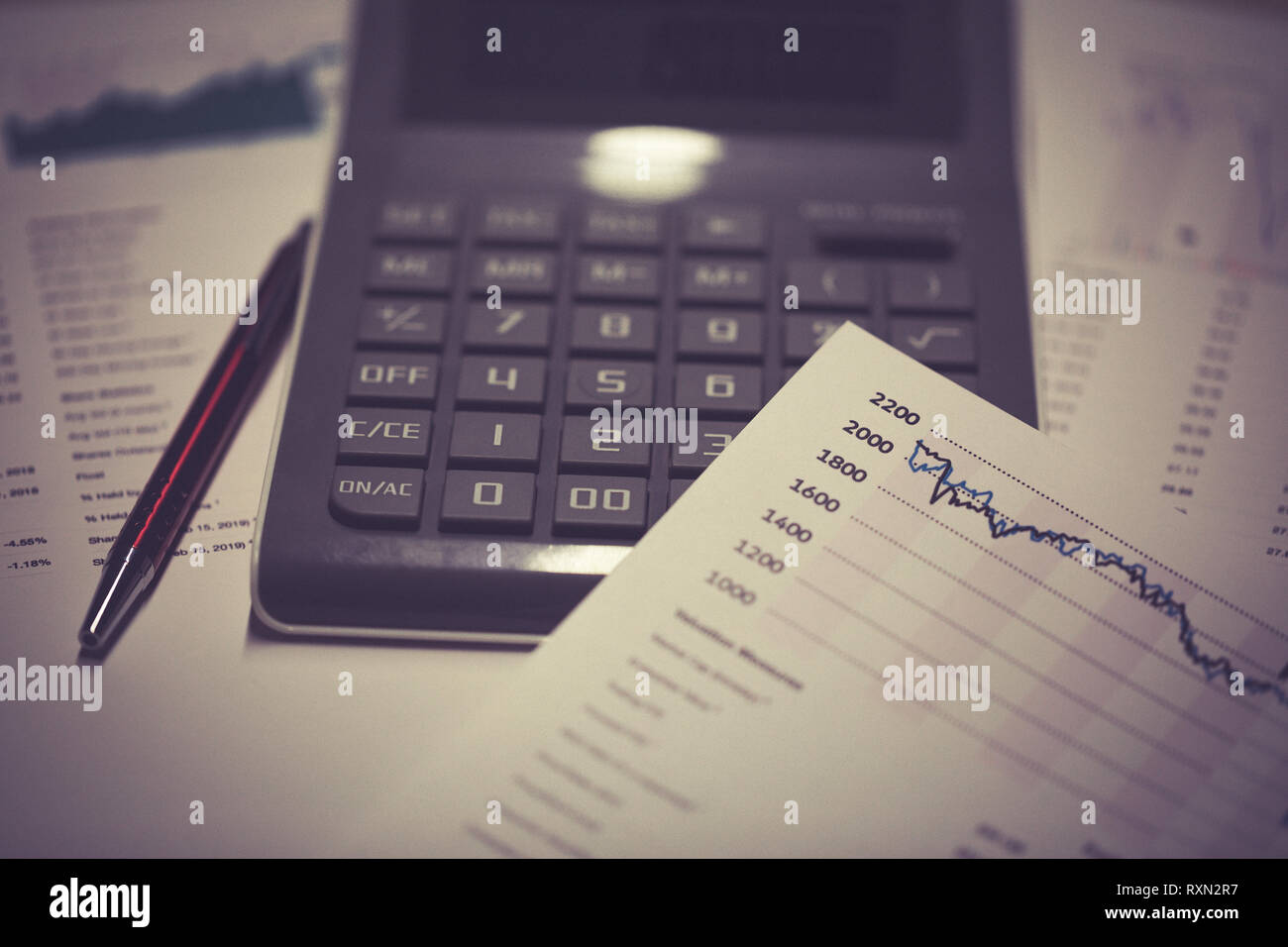 workplace with business documents, charts growth, calculator and pen ...