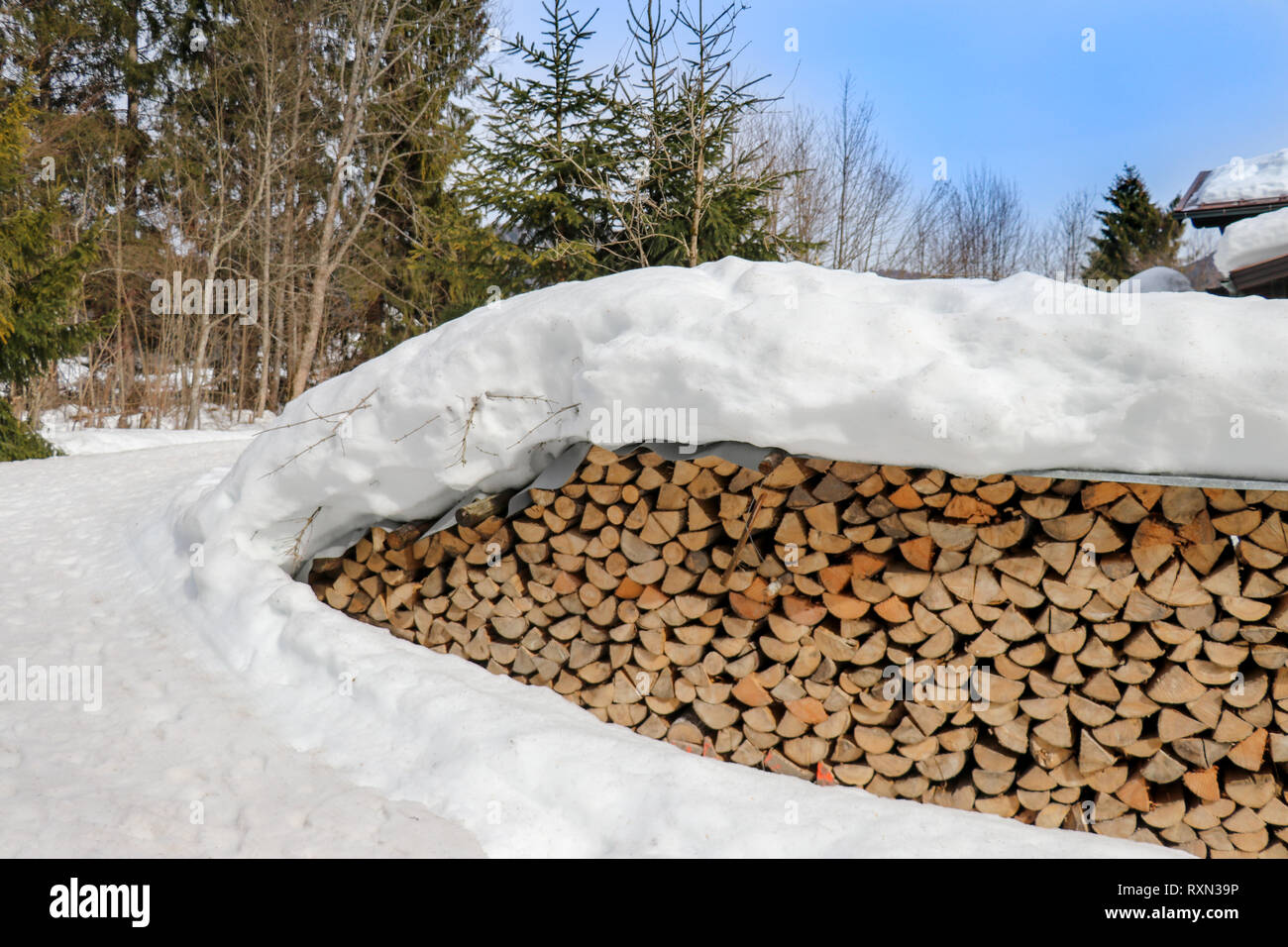 Snow covered firewood hi-res stock photography and images - Alamy