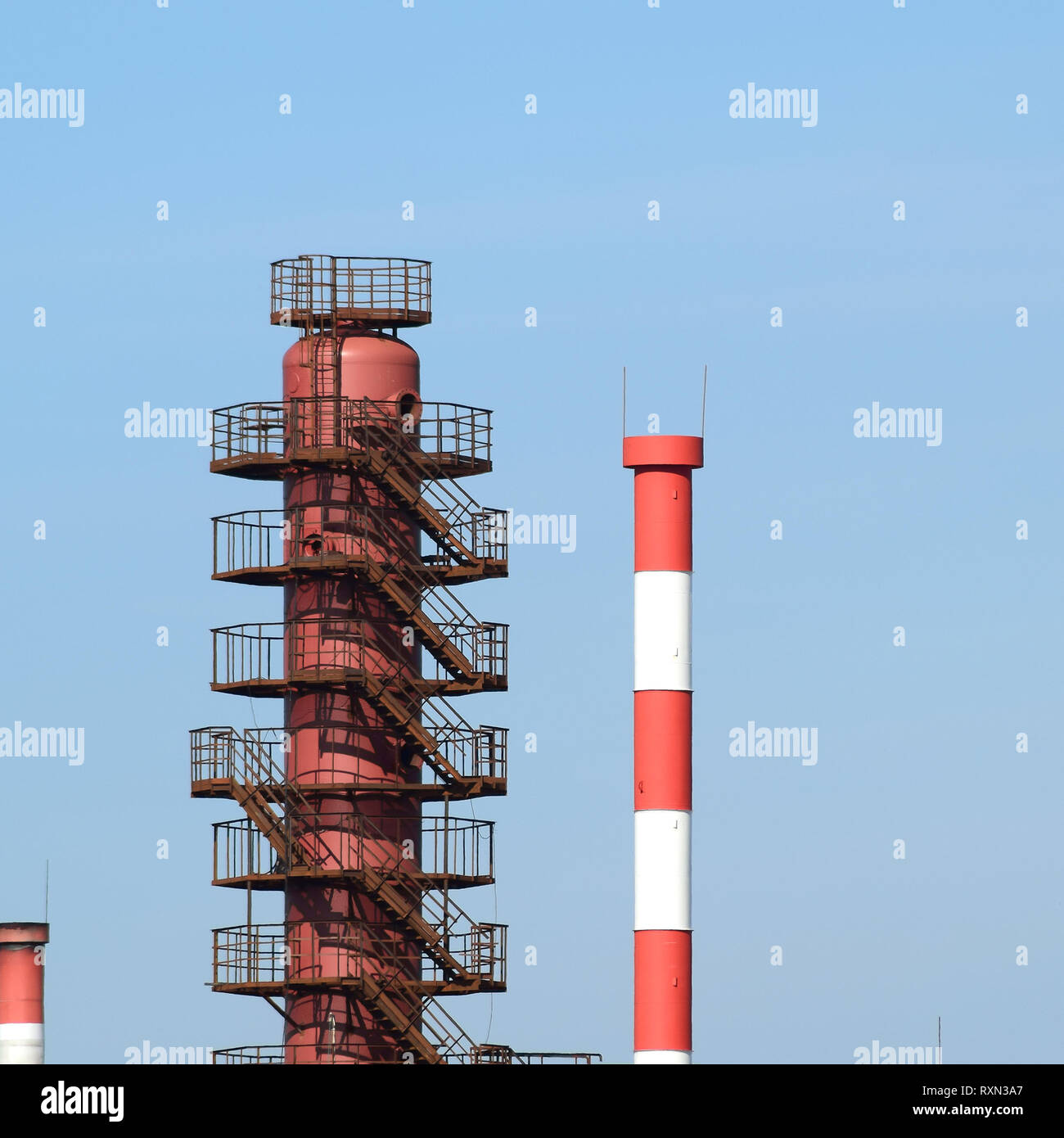 Pipes refinery furnaces and distillation column. The equipment at the ...