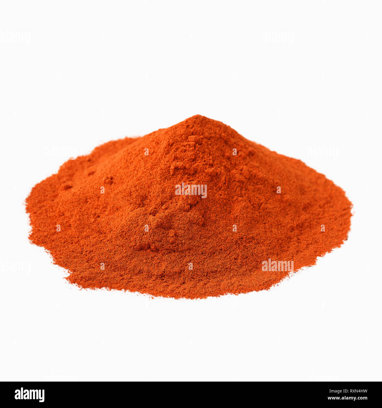Red paprika powder isolated on white background Stock Photo - Alamy