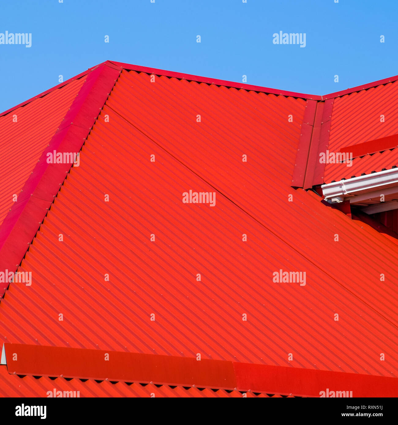 Red corrugated roof. The house roof of corrugated sheet Stock Photo - Alamy