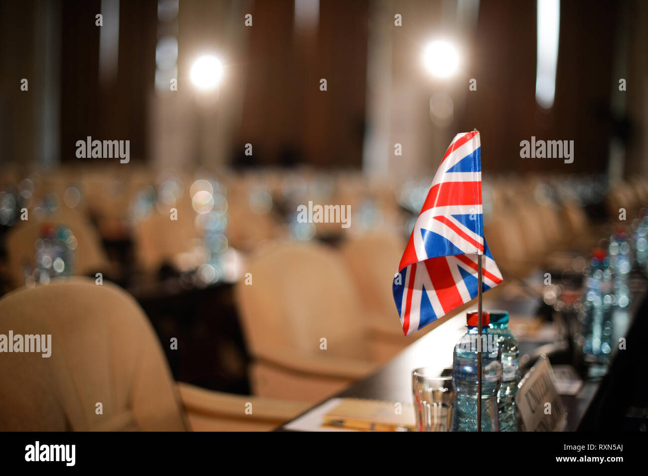 Details with the lonely flag of the United Kingdom during a conference ...