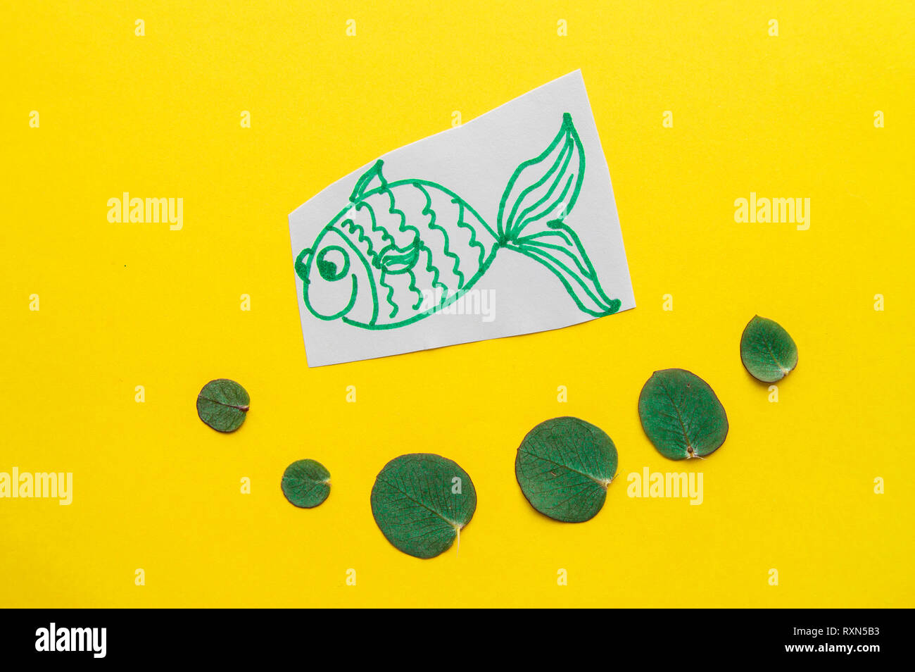 Funny fish with bubbles on yellow background, april Fool's day Stock ...