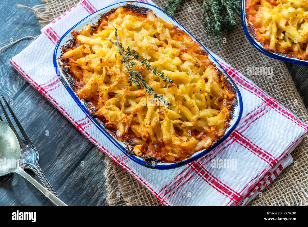 Swiss style potato rosti and pork bake Stock Photo - Alamy
