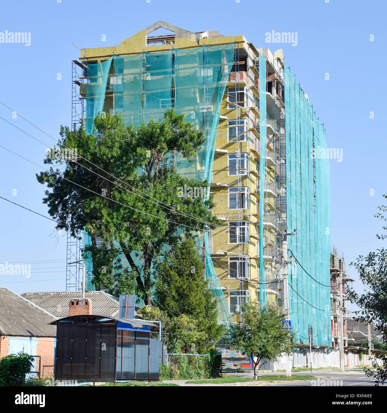 Safety net in the newly built high-rise building. Green grid on ...