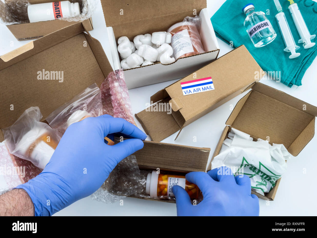 Nurse unpacking medication in boxes, Diverse medicines in boxes for ...