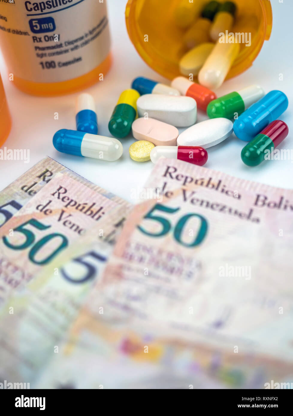 Medicines next to banknotes of Venezuela, shady deal of medication in ...