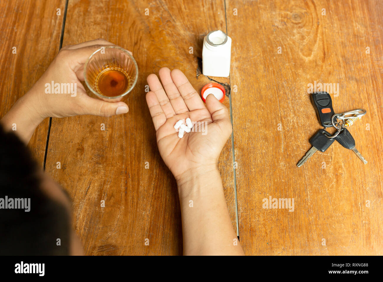 Alcohol with drugs on table hi-res stock photography and images - Alamy