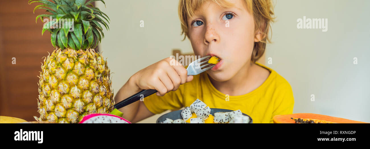 Boy eats fruit. Healthy food for children. Child eating healthy snack ...