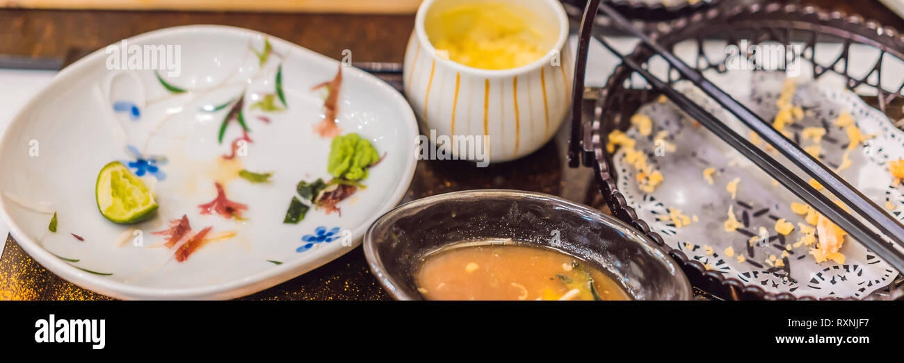 Messy table after meal in Japanese restaurant. Dirty, finish meal ...