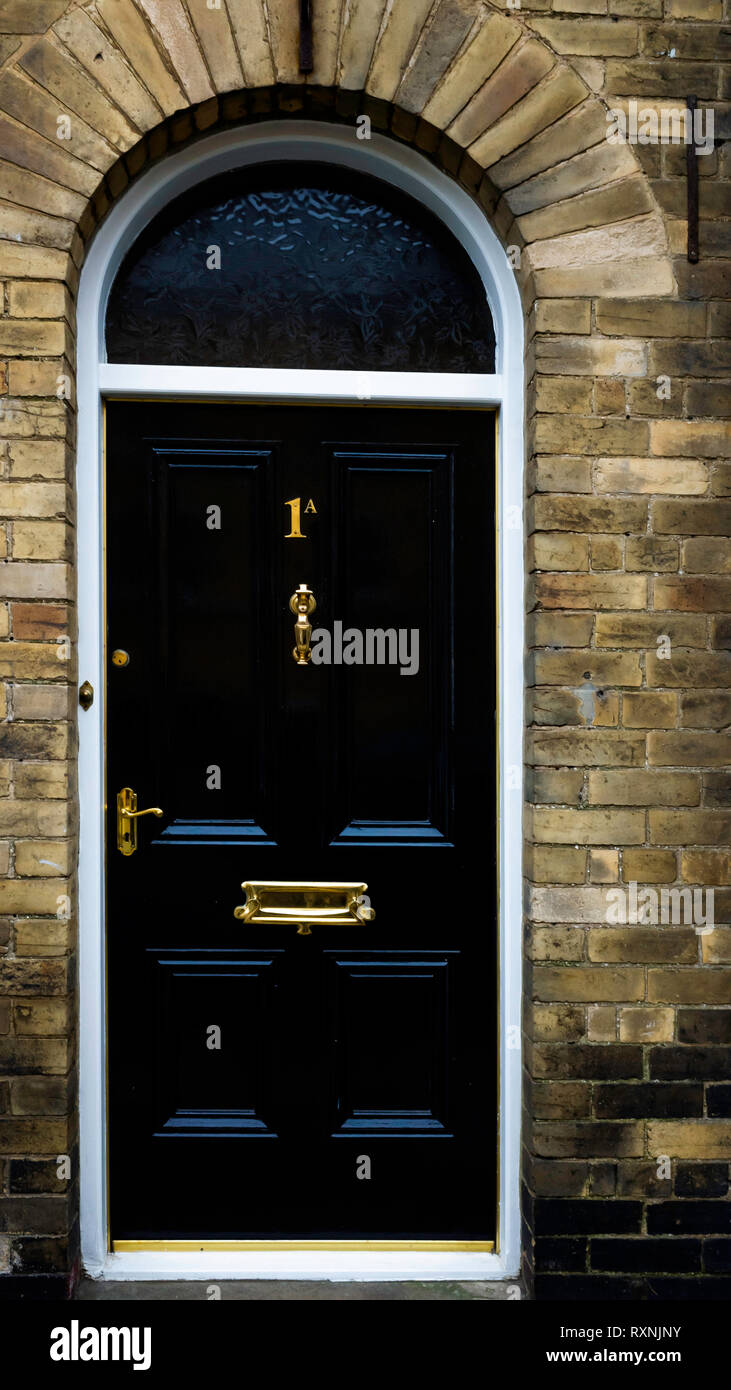 Black front door with knocker hi-res stock photography and images - Alamy