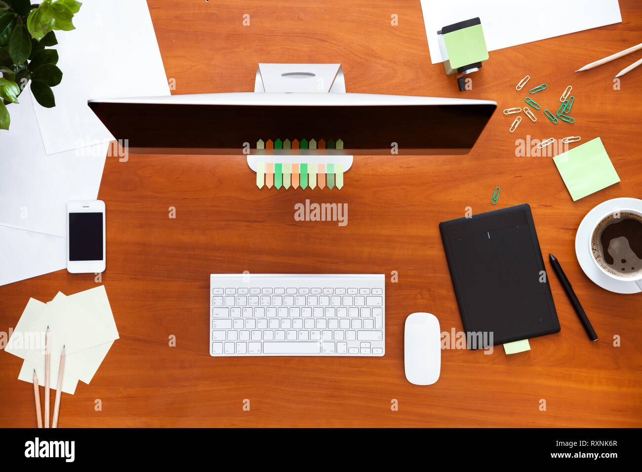 Business work desk with computer monitor keyboard mouse and supplies ...