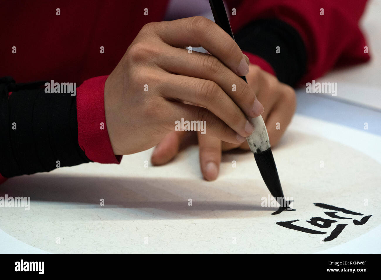 japanese woman writing ideograms with brush close up detail Stock Photo ...
