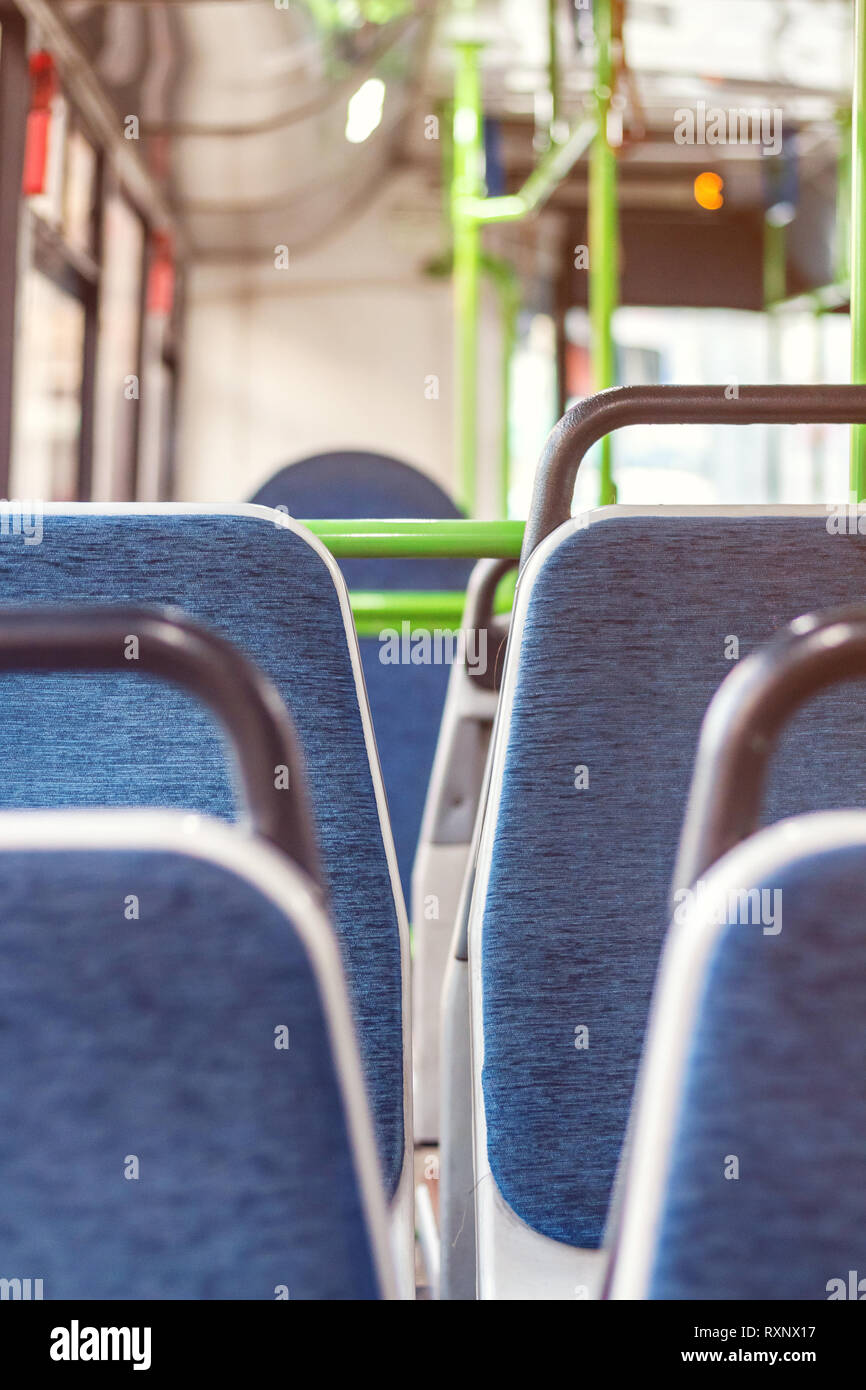 Seats in the city bus. Vertical composition Stock Photo - Alamy