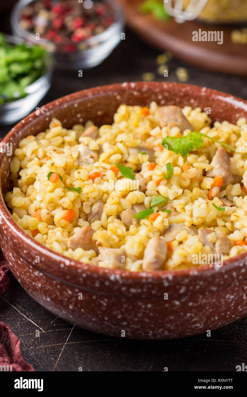 Bulgur with turkey, pork or beef. Eastern dish of rice, delicious ...