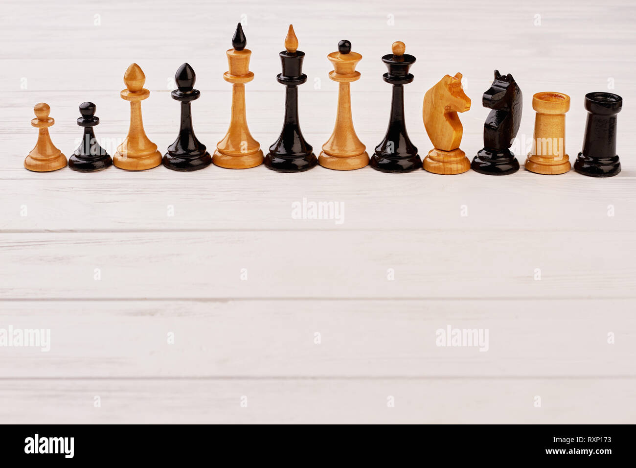 Chess pieces composition on white background Stock Photo - Alamy