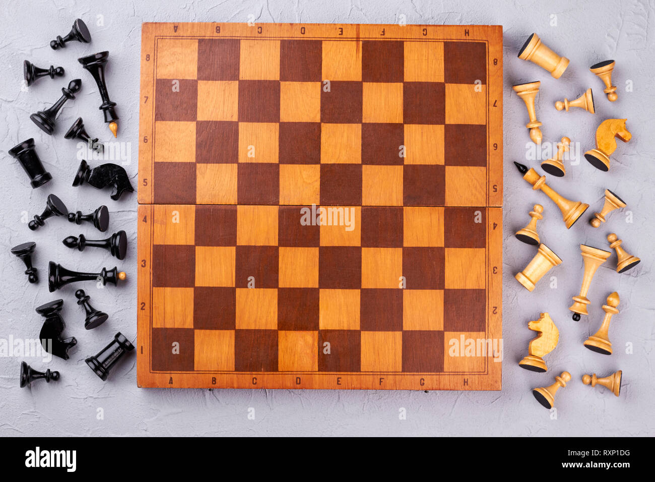 Wooden chess board and chess pieces, top view Stock Photo - Alamy